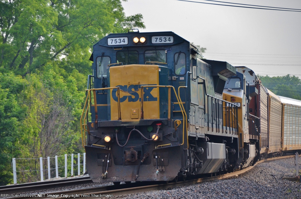 CSX 7534 heads west at AY on track 2.